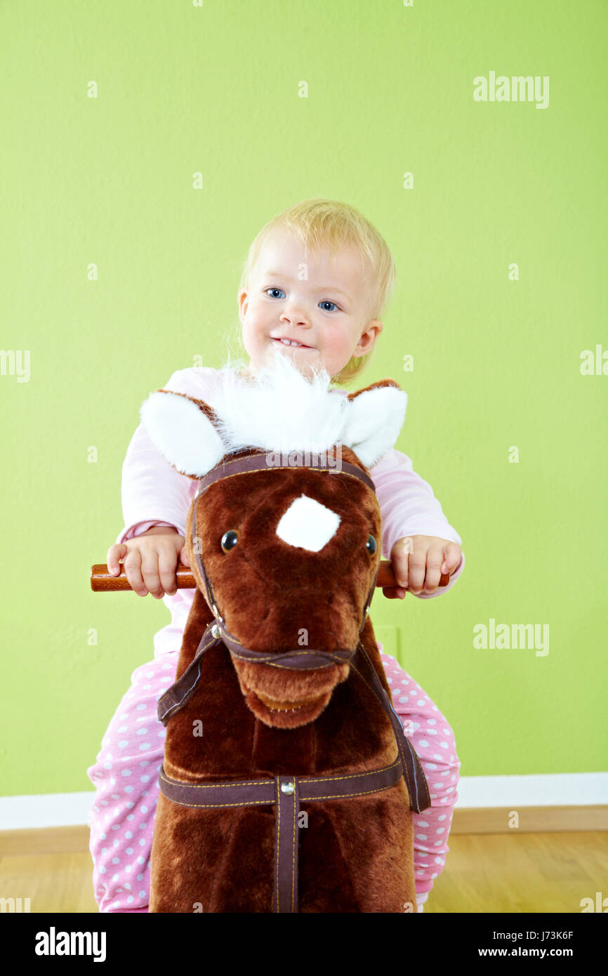 toddler and rocking horse Stock Photo - Alamy