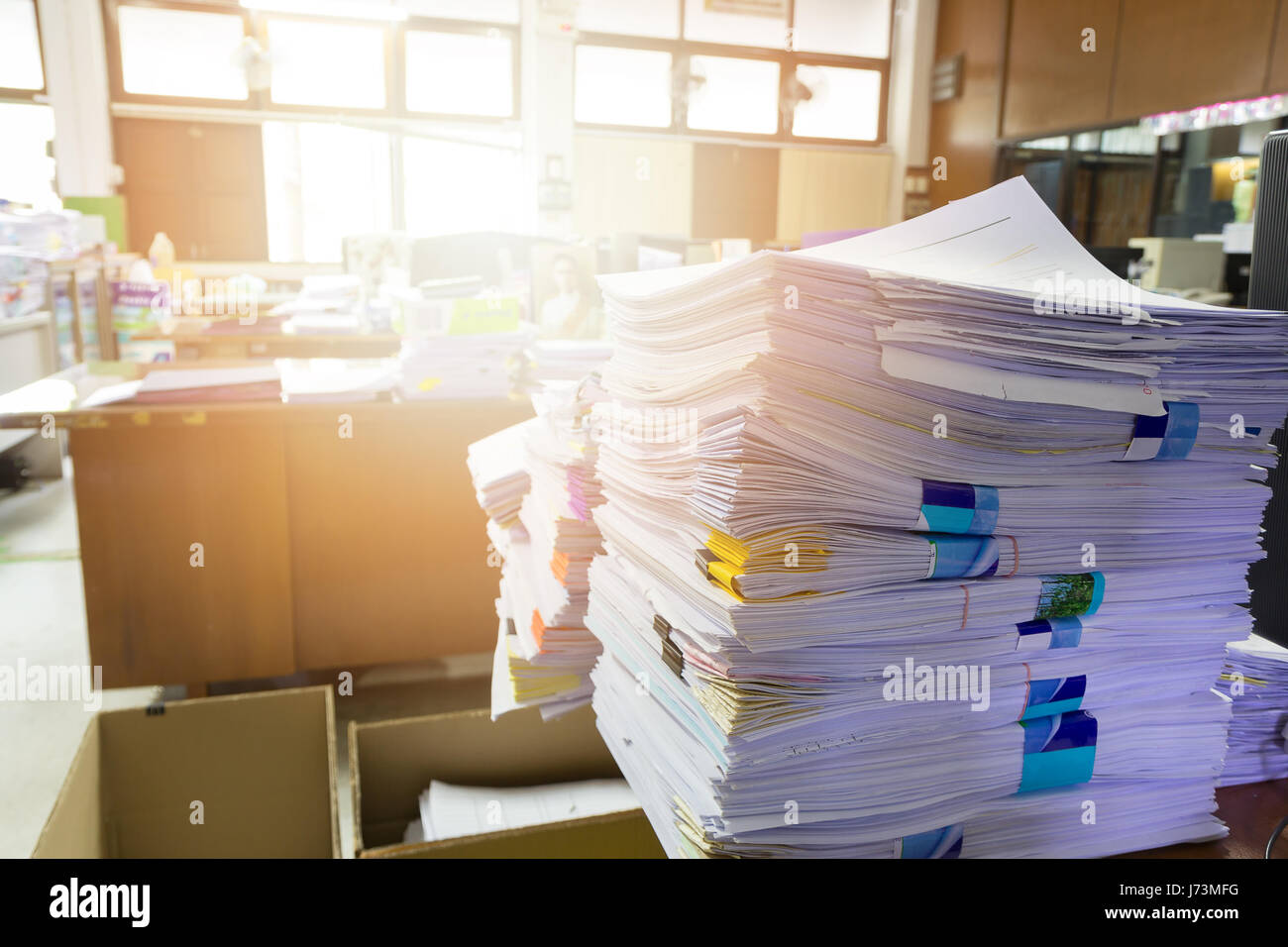 Pile of unfinished documents on office desk, Stack of business paper ...