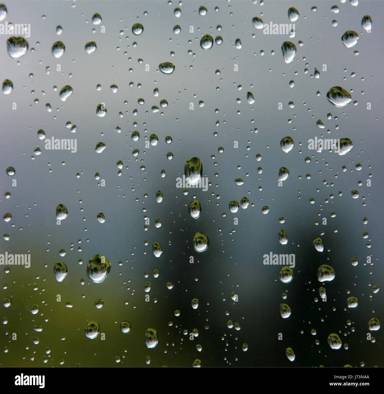 window porthole dormer window pane raindrop drop rain grey gray water ...