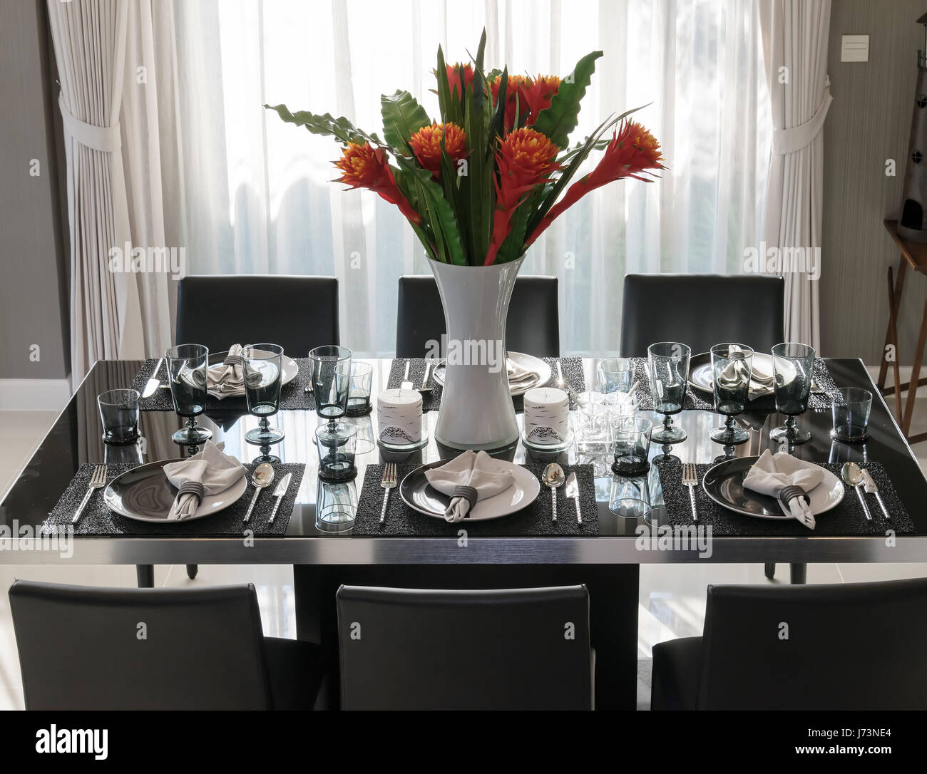 dining table and comfortable chairs in modern home with elegant table ...
