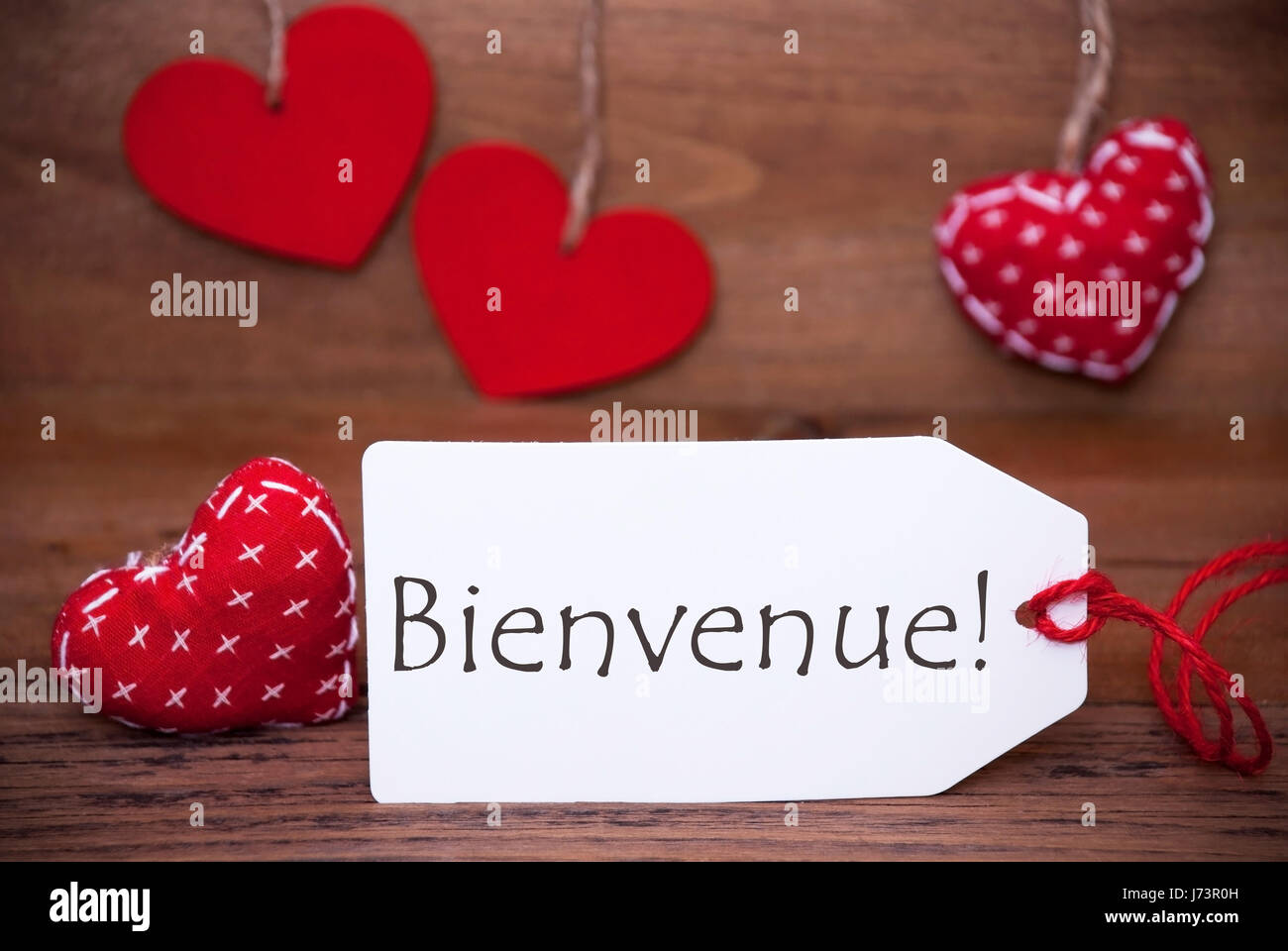 Label With French Text Bienvenue Means Welcome. White Label With Red ...