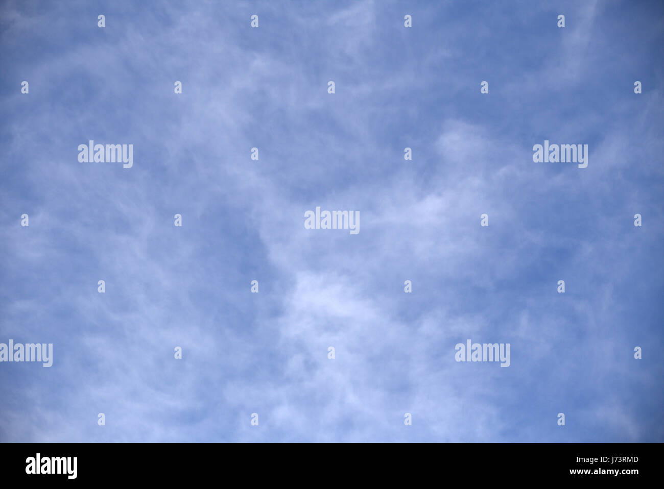 blue sky cirrus clouds white and stringy Stock Photo - Alamy