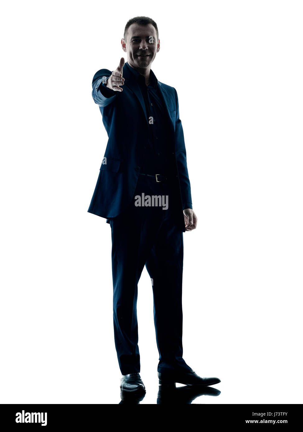 one caucasian business man standing handshake silhouette isolated on ...