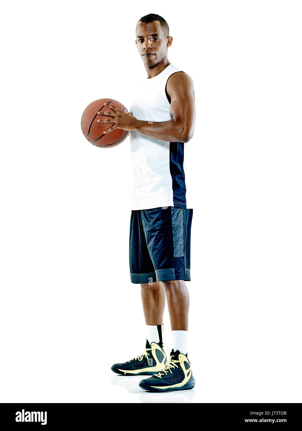 one basketball player man Isolated on white background Stock Photo - Alamy