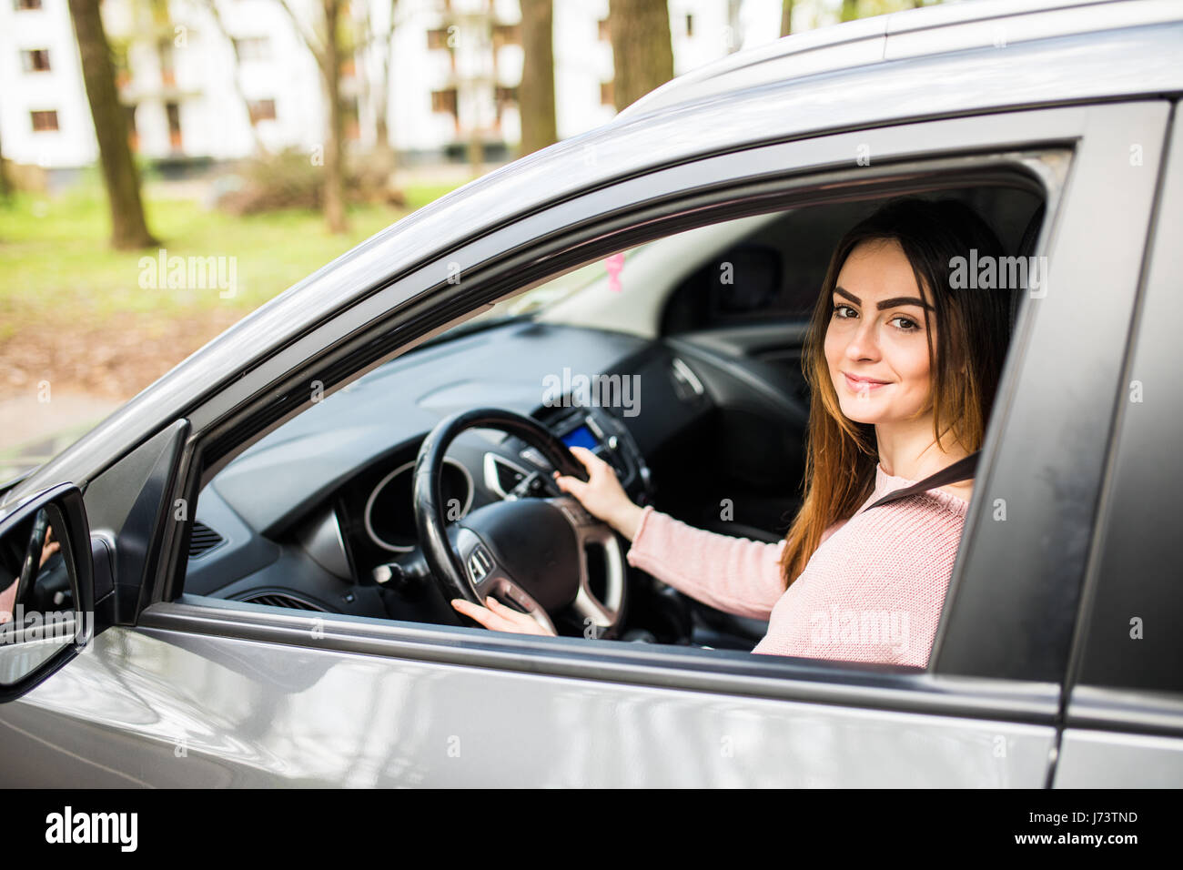 Confident and beautiful. Rear view of attractive young woman in casual ...