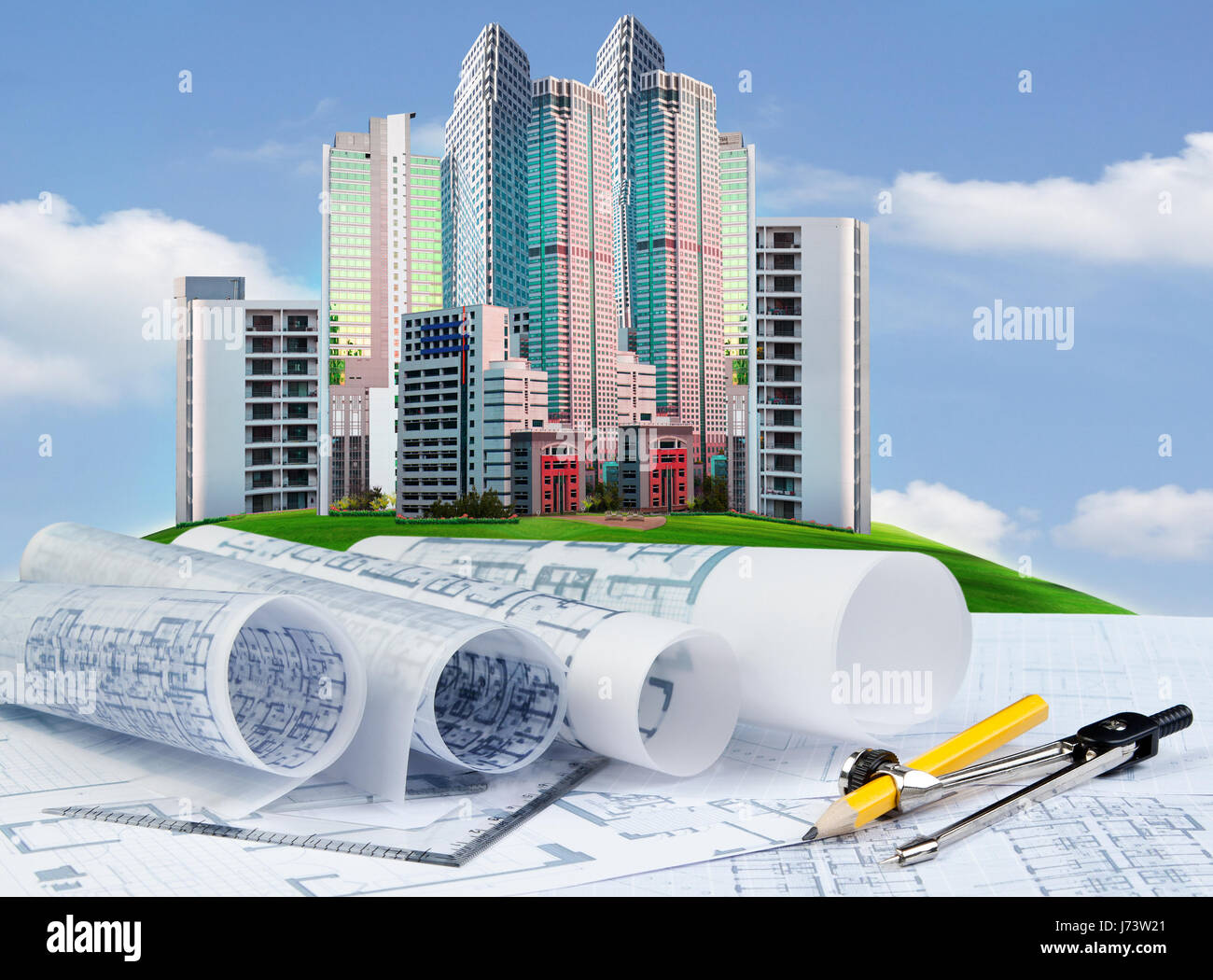plan of building construction on engineer working table against ...