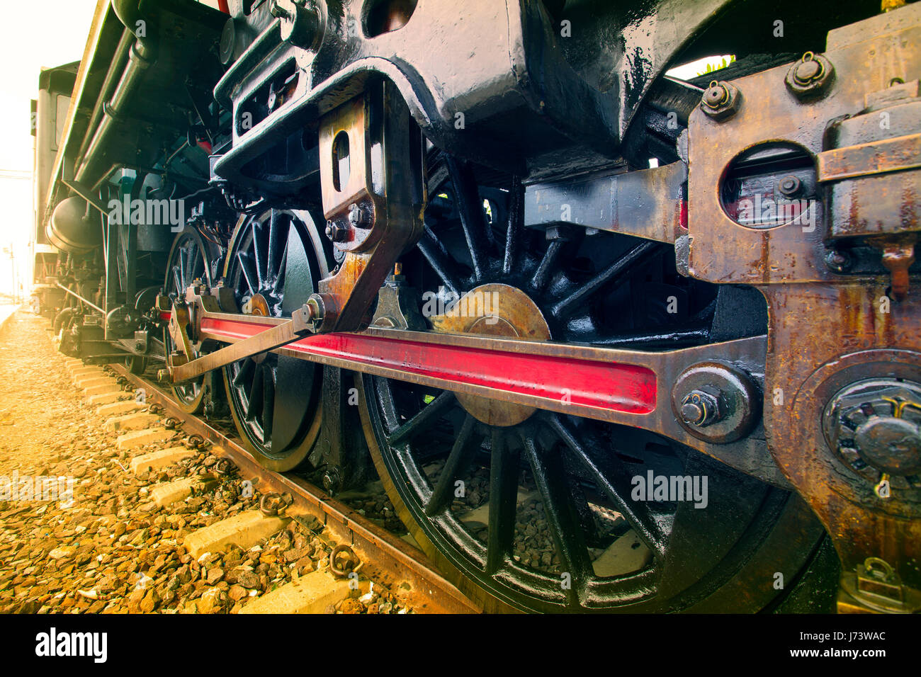 iron wheels of stream engine locomotive train on railways track ...