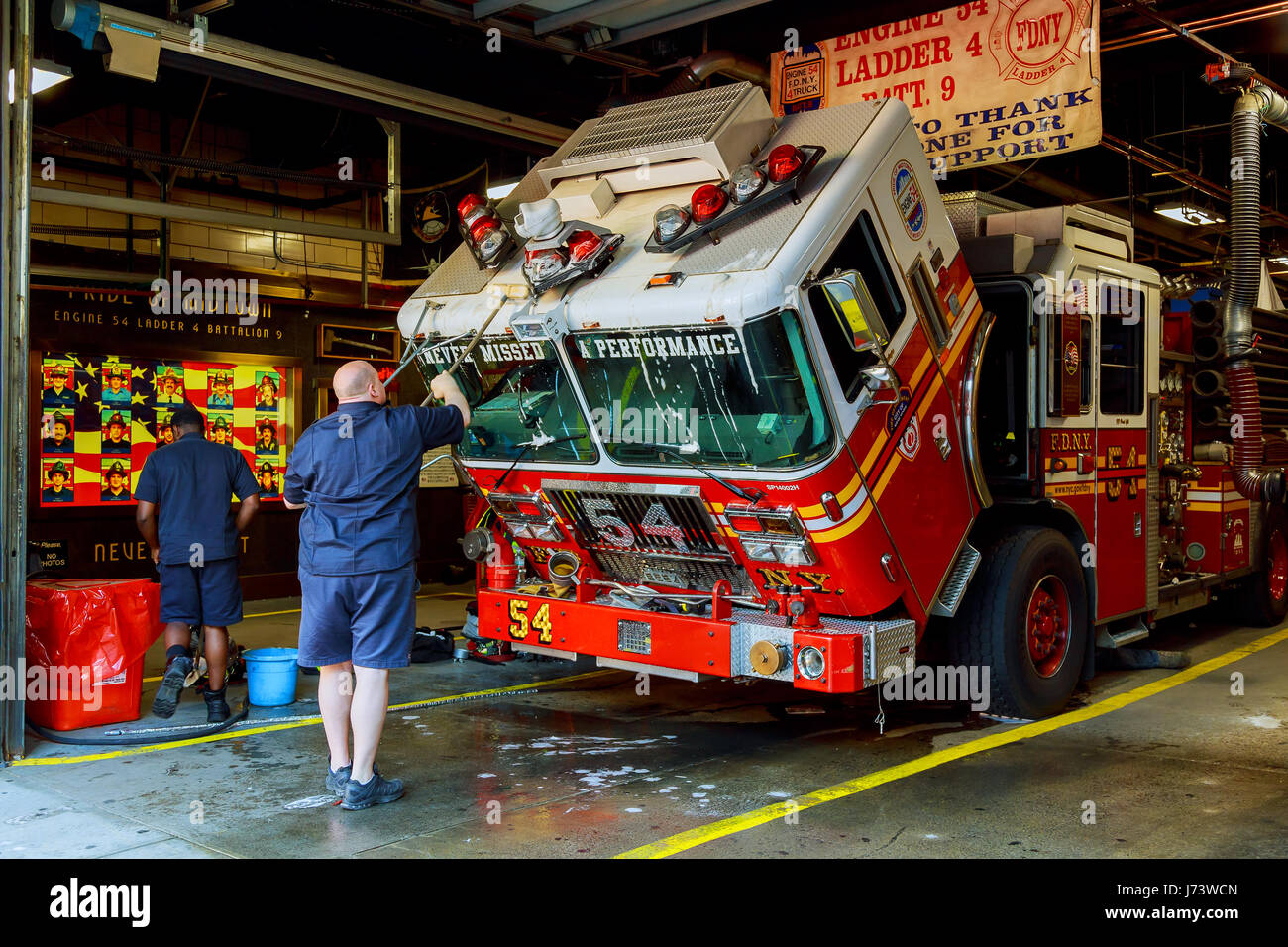 NEW YORK CITY, USA - 04, 2017 : FDNY fire truck backs into garage ...