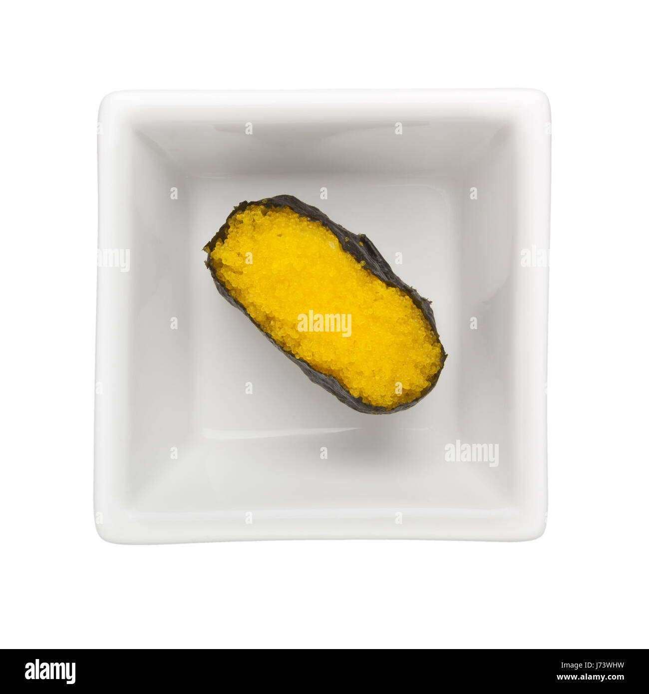 Yuzu tobiko gunkan Sushi - Yuzu tobiko gunkan in a square bowl isolated ...