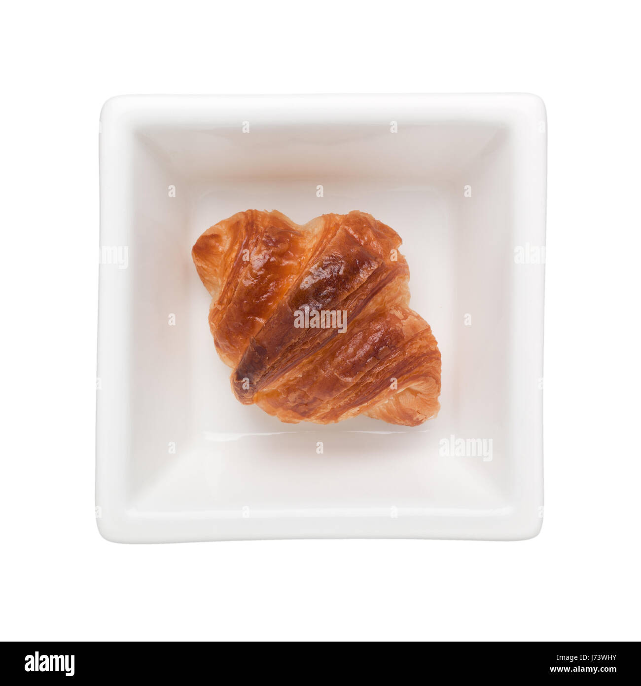 Mini croissant in a square bowl isolated on white background Stock ...
