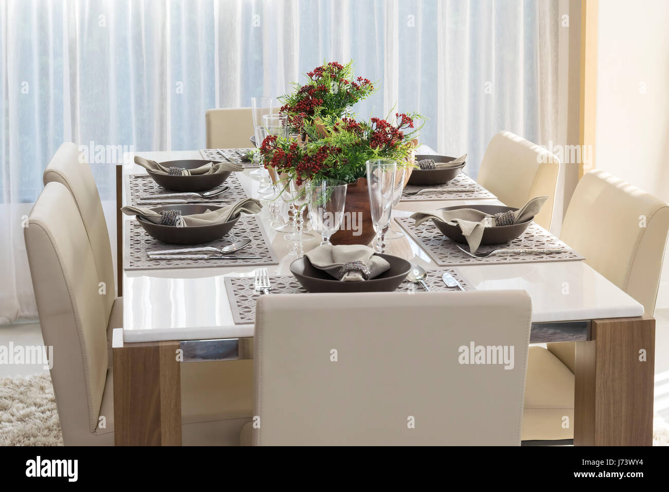 dining table and comfortable chairs in modern home with elegant table ...