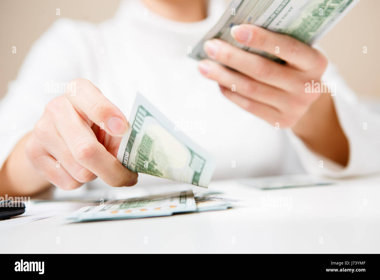 Hands counting money, close up Stock Photo - Alamy