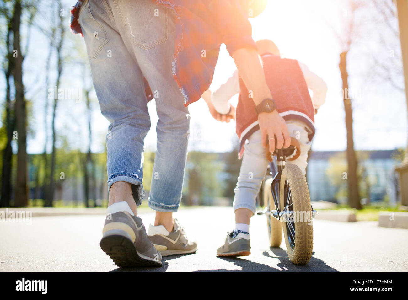 Teaches son bike hi-res stock photography and images - Alamy
