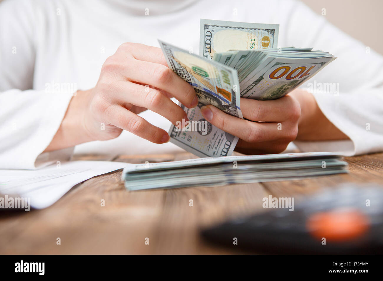 Hands counting money, close up Stock Photo - Alamy