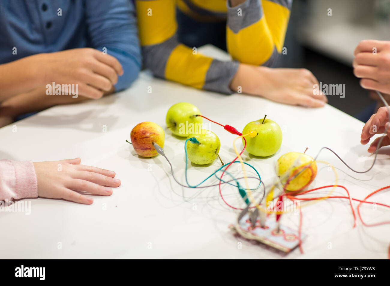 kids hands with invention kit at robotics school Stock Photo - Alamy