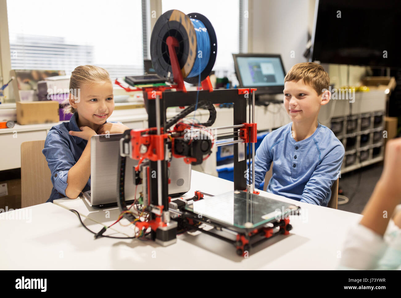 happy children with 3d printer at robotics school Stock Photo - Alamy
