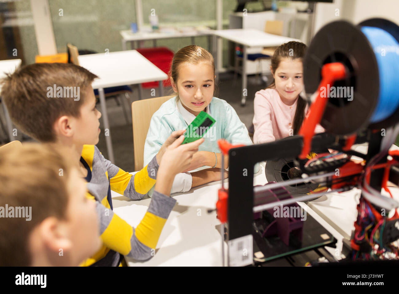 happy children with 3d printer at robotics school Stock Photo - Alamy