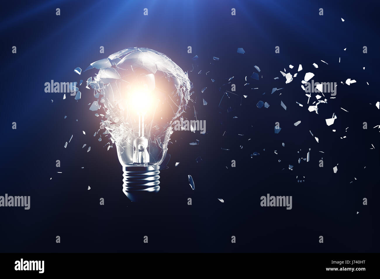 Exploding light bulb on a blue background, with concept creative ...