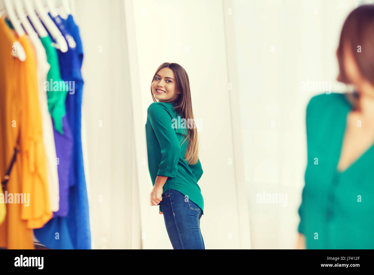 Woman looking at clothes in wardrobe hi-res stock photography and ...