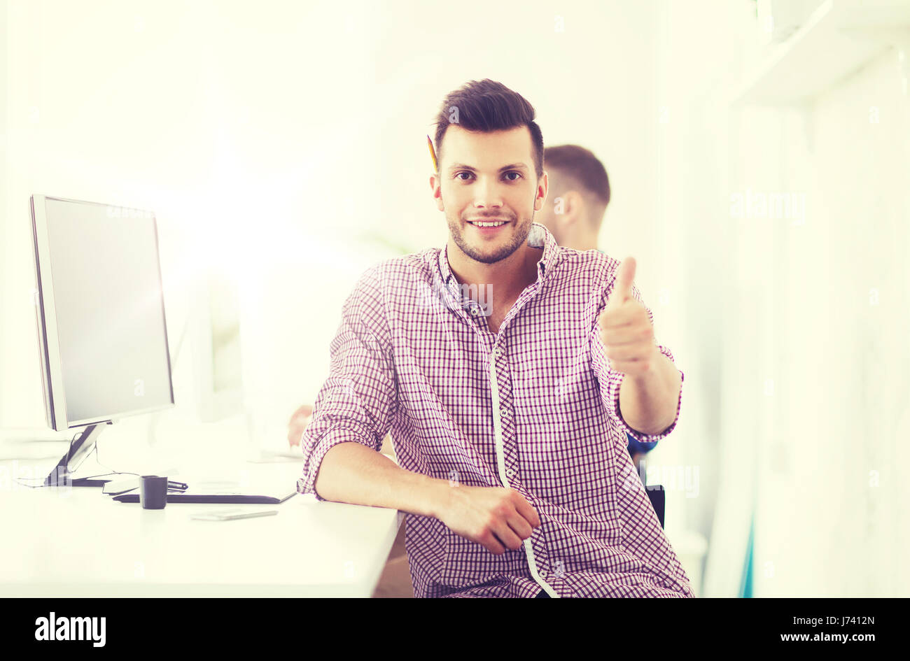 happy creative man with computer at office Stock Photo - Alamy