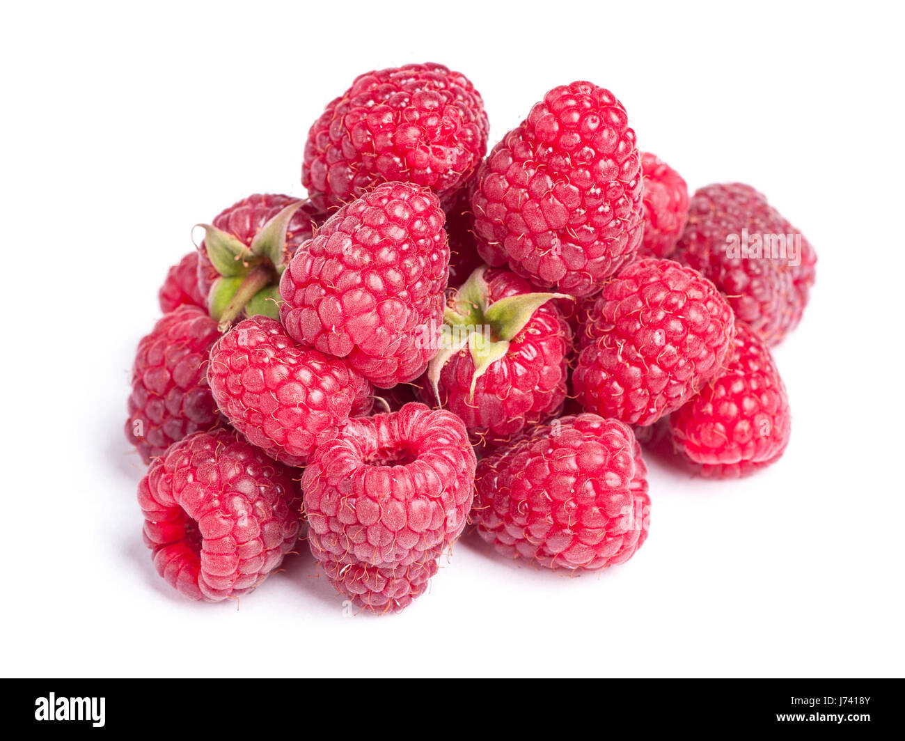 Heap of raspberries isolated on white background Stock Photo - Alamy