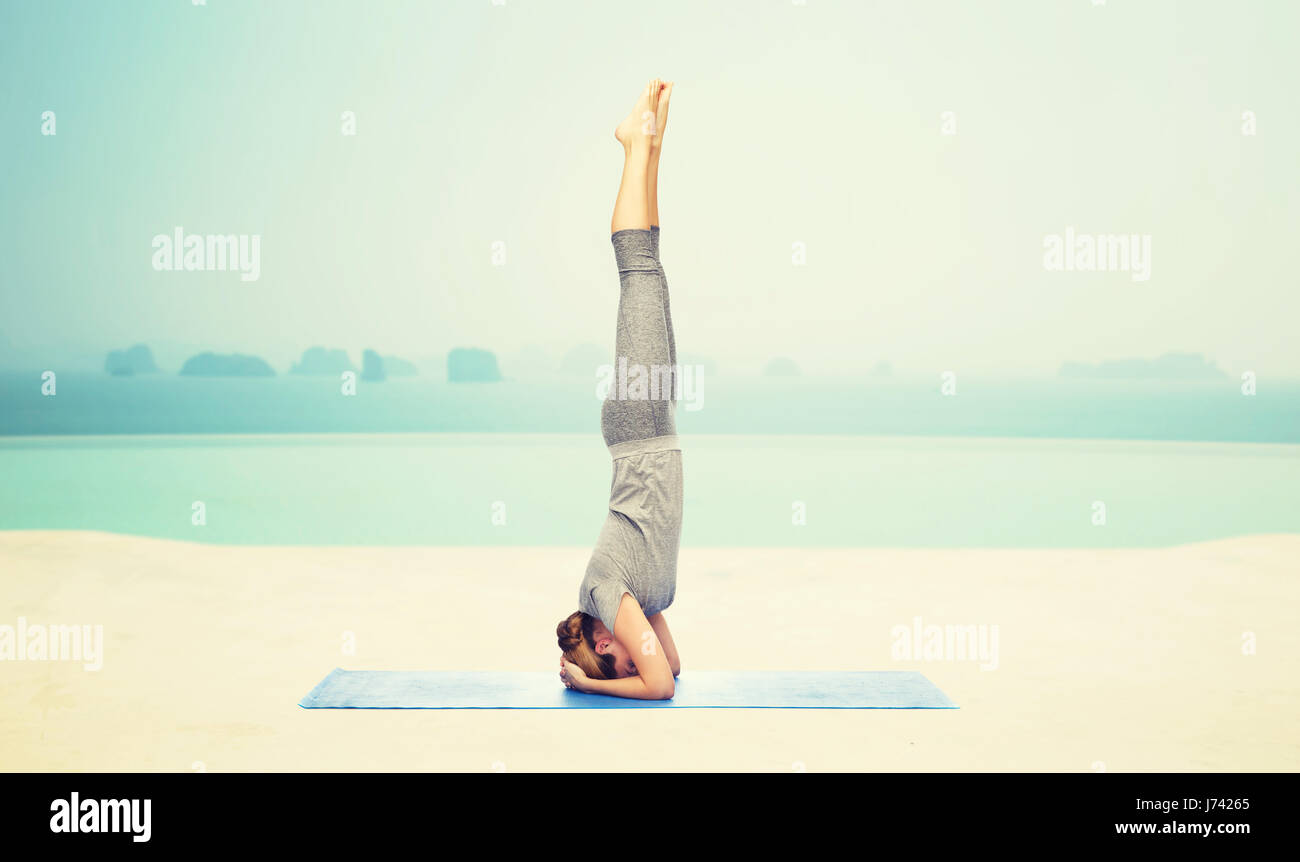 Headstand position hi-res stock photography and images - Alamy