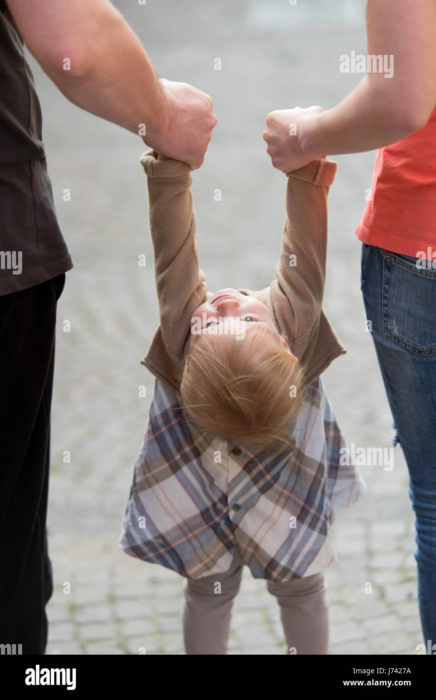 Small baby holding parents hand hi-res stock photography and images - Alamy