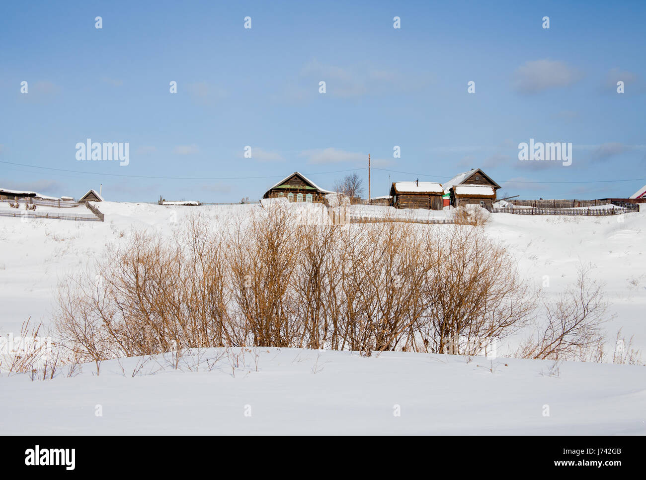 Winter rural landscape on the river Chusovoy in the village of Sloboda ...