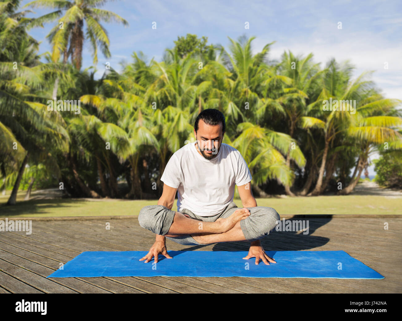 Happy man scale hi-res stock photography and images - Alamy