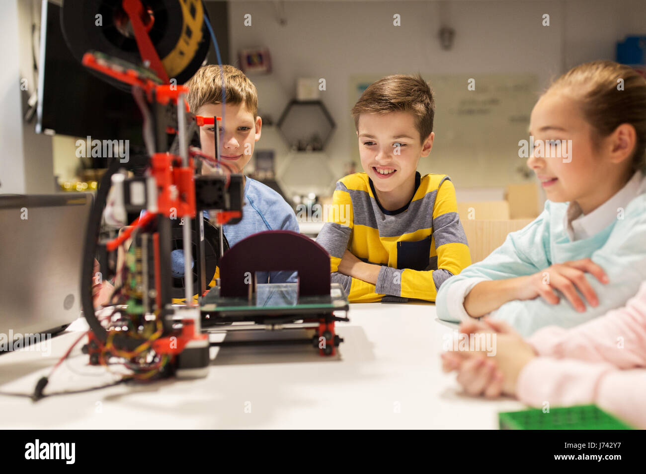 happy children with 3d printer at robotics school Stock Photo - Alamy
