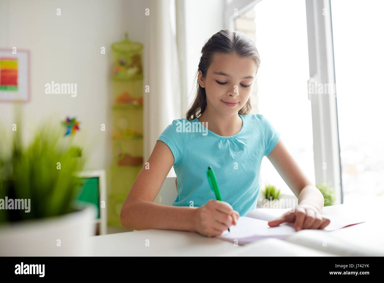 Teen writing home desk hi-res stock photography and images - Alamy