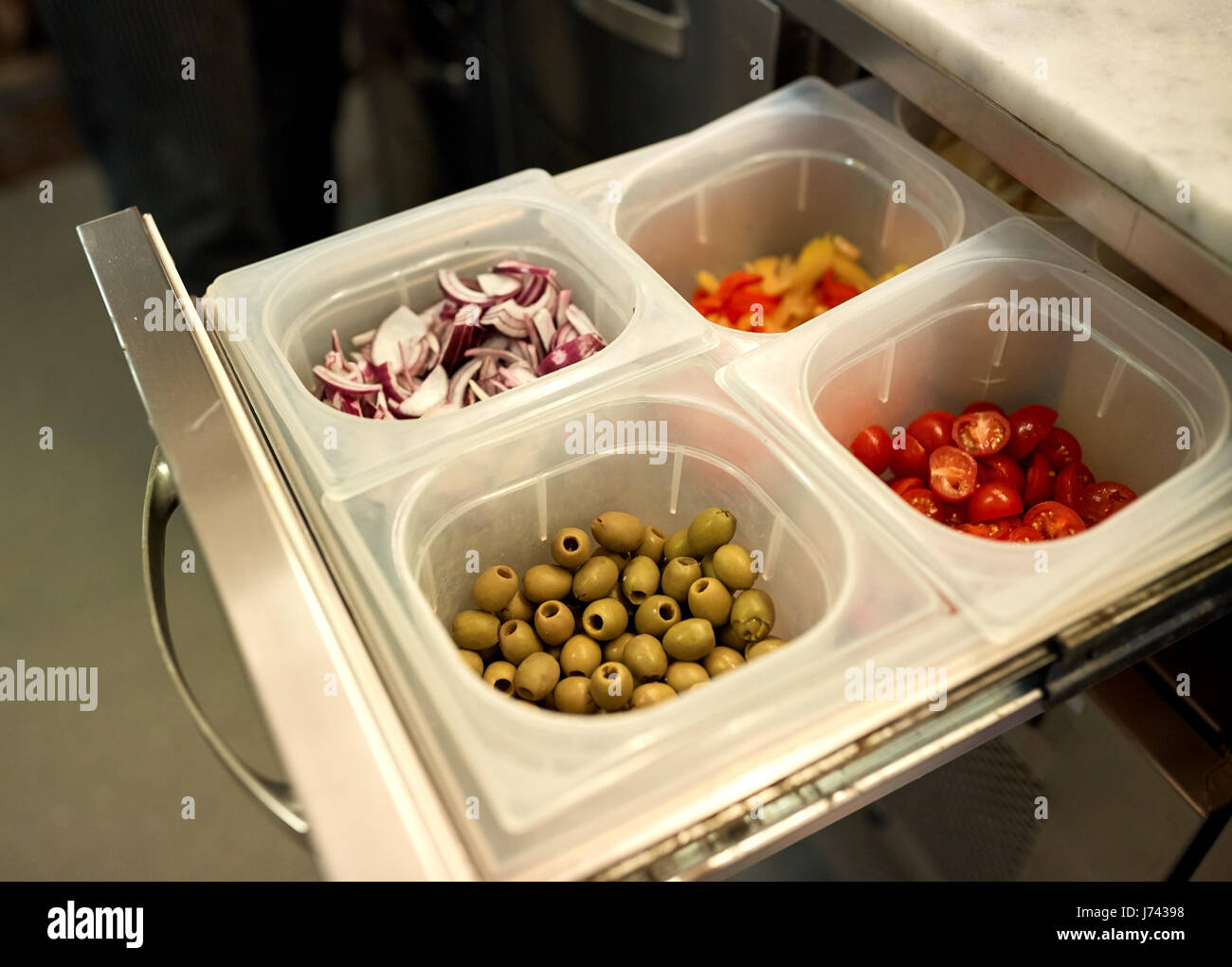 containers with food at restaurant kitchen Stock Photo - Alamy