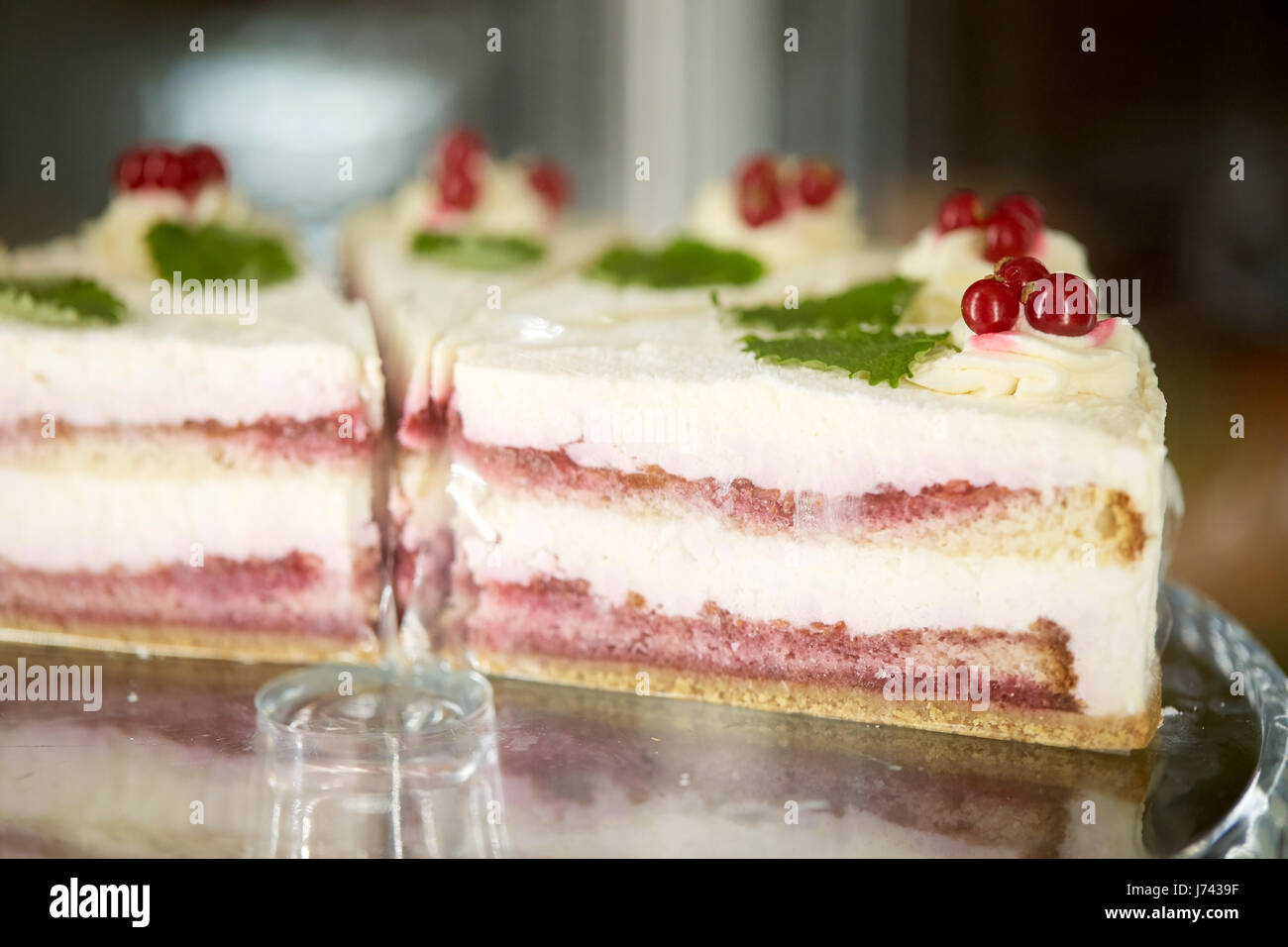 pieces of cake on stand Stock Photo - Alamy