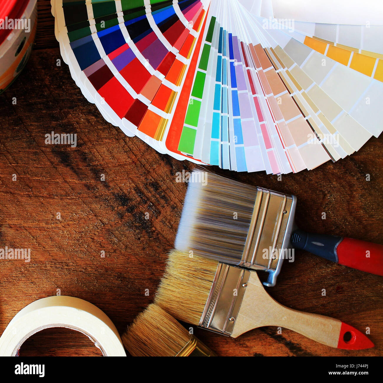 various painting tools and color palette on wooden background Stock ...