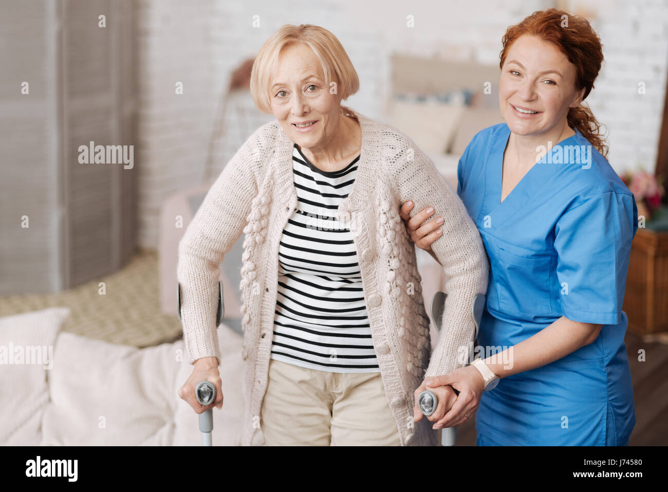 Happy mature woman having a walk after recovery Stock Photo - Alamy