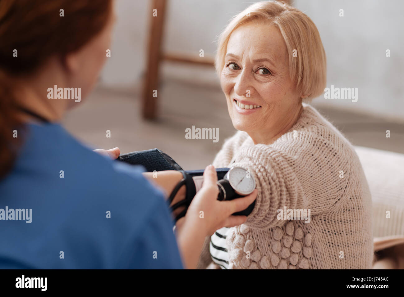 Elegant positive woman undergoing some tests Stock Photo - Alamy