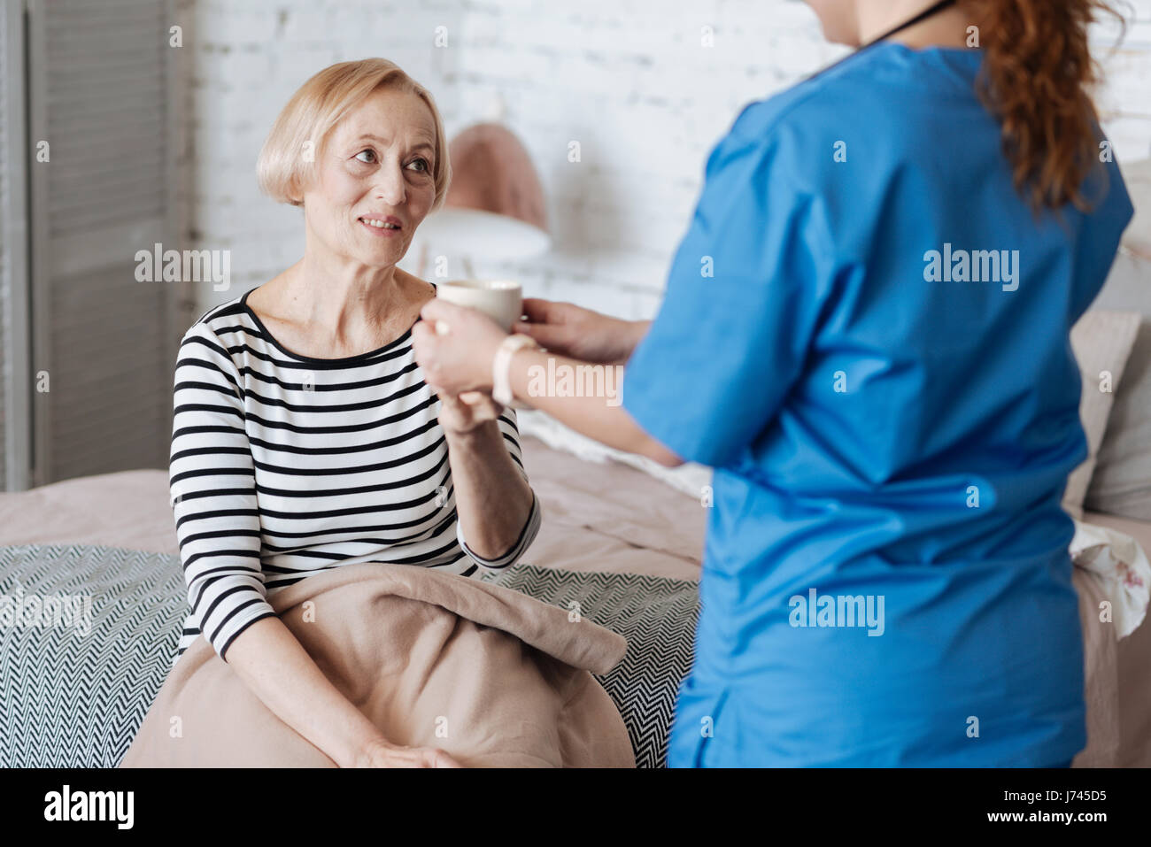 Graceful adorable woman recovering from cold Stock Photo - Alamy