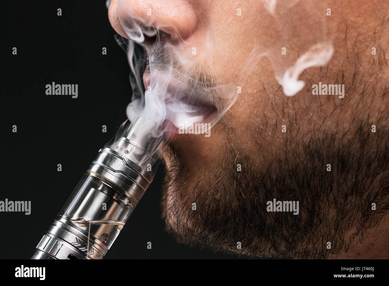Person vaping hi-res stock photography and images - Alamy