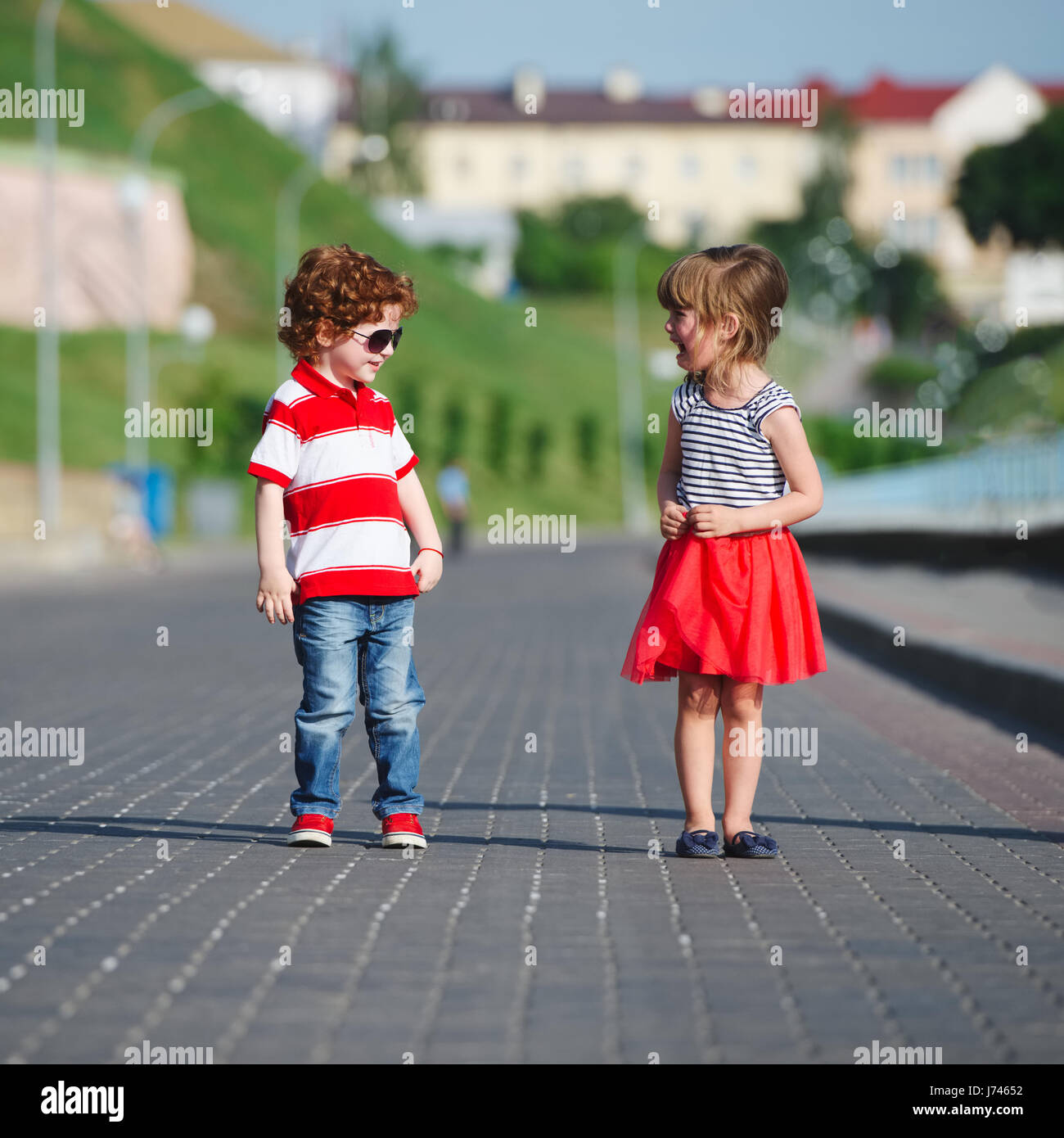 happy boy and crying girl Stock Photo - Alamy