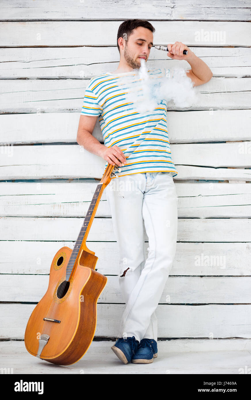 The face of vaping young man Stock Photo - Alamy