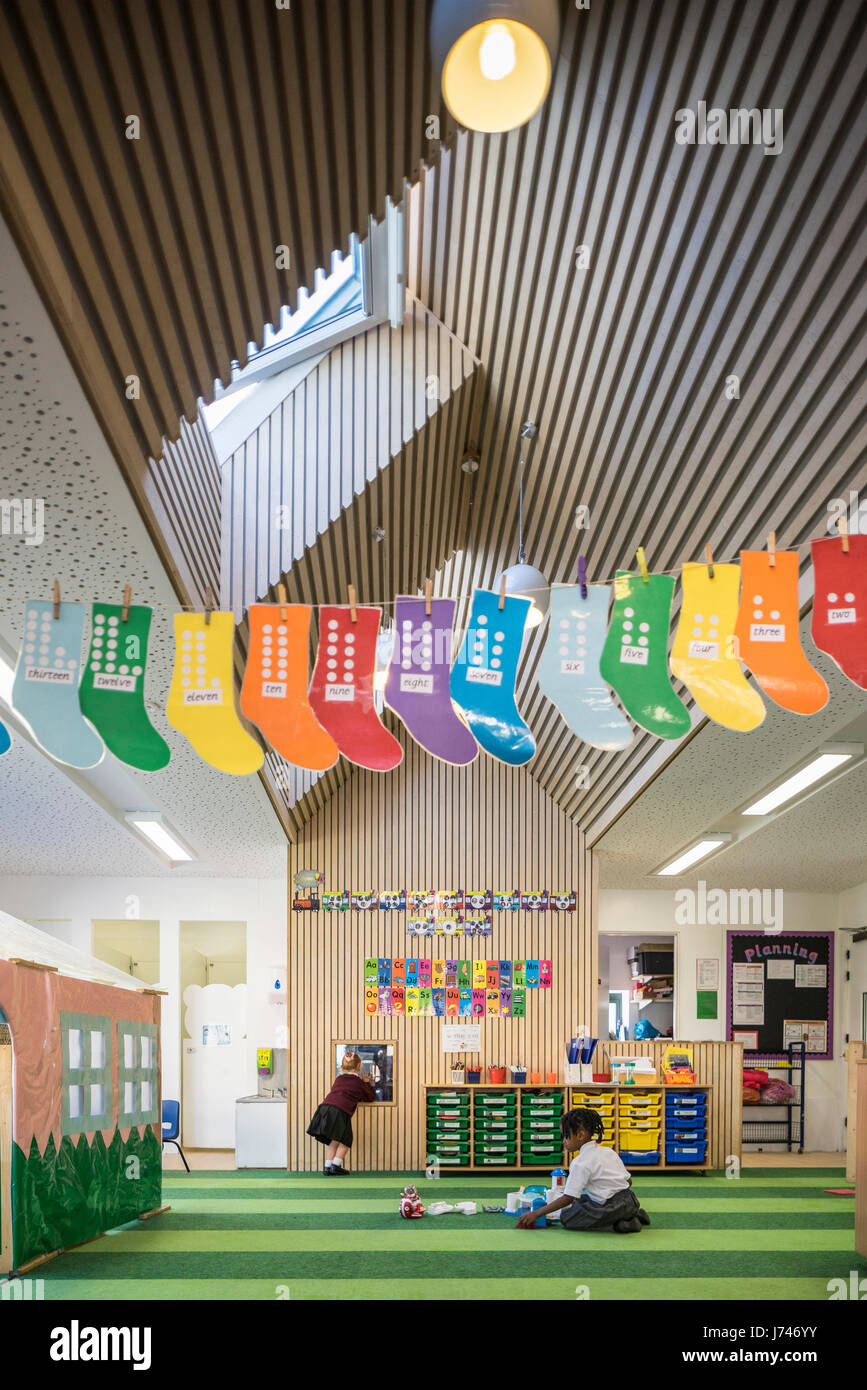 Classroom with sloped ceiling and rooflight. Whitehorse Manor Junior ...