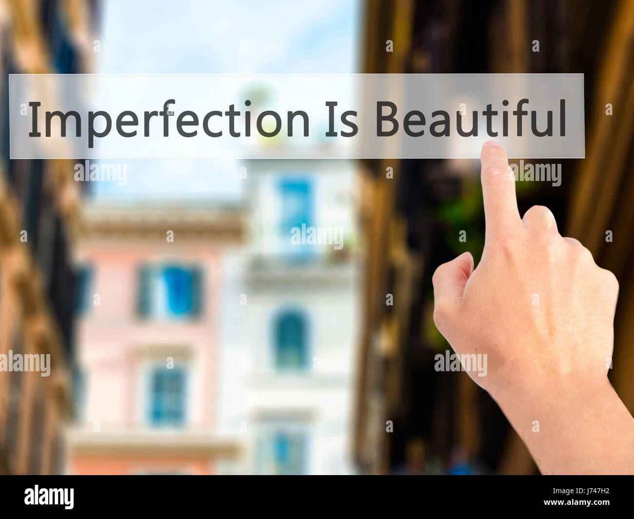 Imperfection Is Beautiful - Hand pressing a button on blurred ...