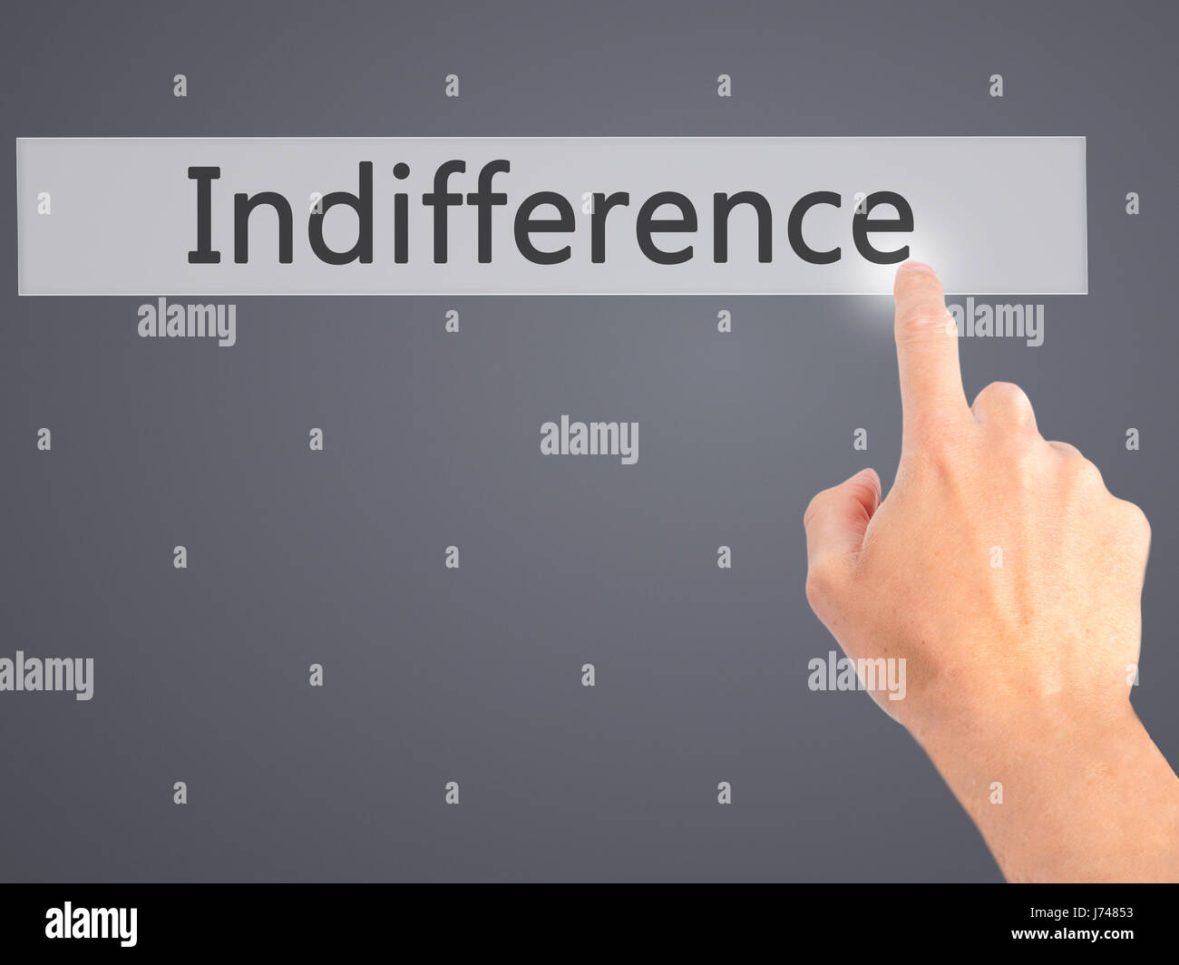 Indifference - Hand pressing a button on blurred background concept ...