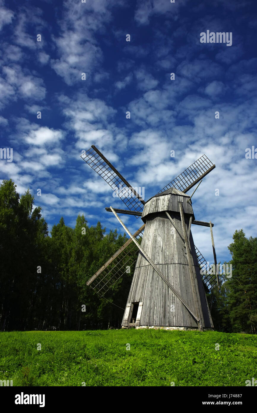 traditional windmill mill wooden clouds old ancient meadow blue tree ...