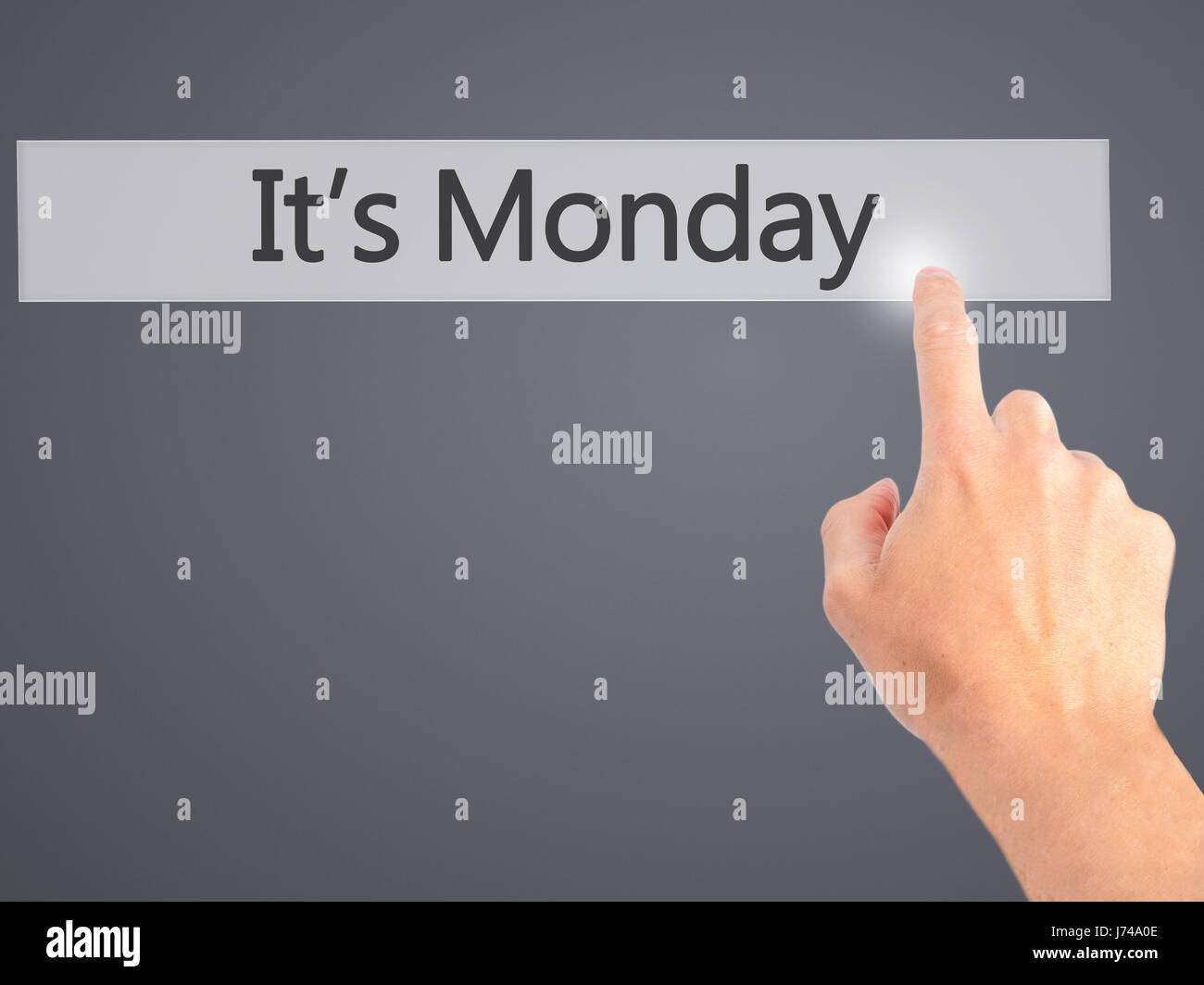 It's Monday - Hand pressing a button on blurred background concept ...