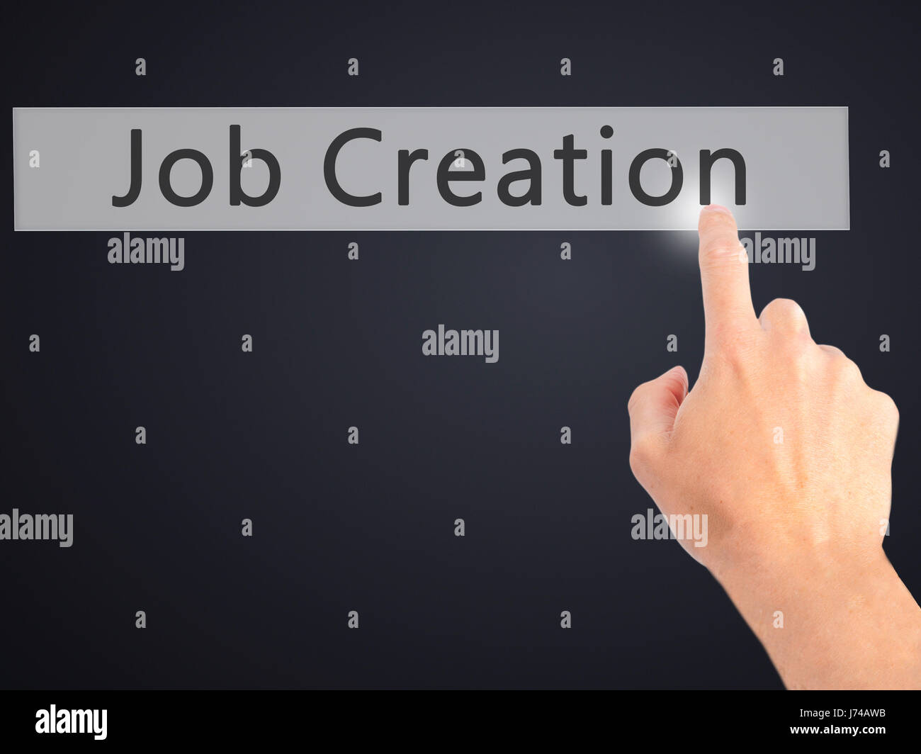 Job Creation - Hand pressing a button on blurred background concept ...