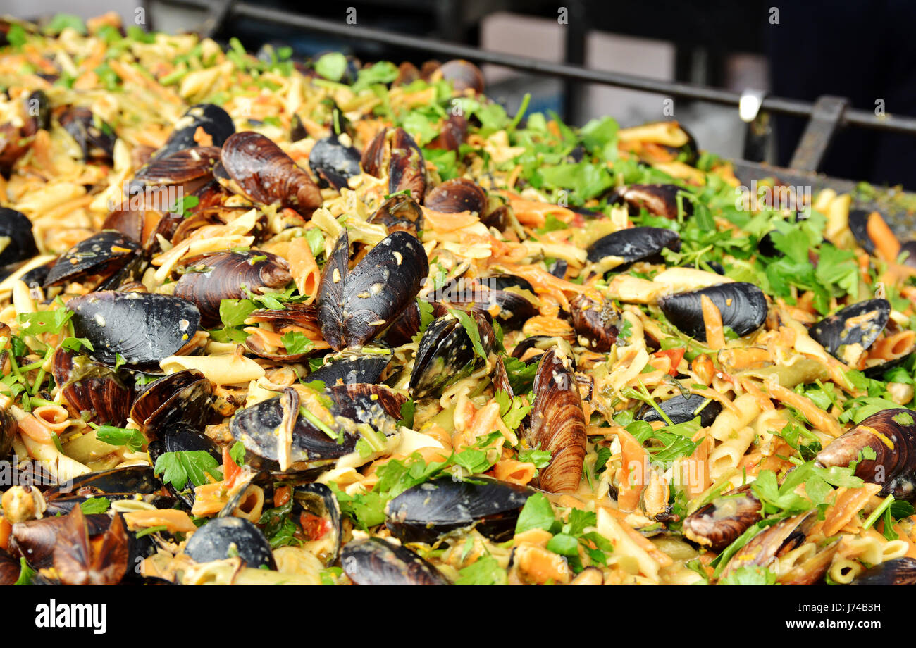 Cooking pasta with mussels in the shell Stock Photo - Alamy