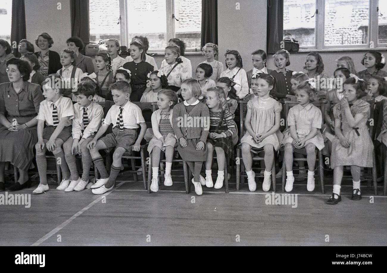 1950, an audience of primary school children, teachers and parents ...