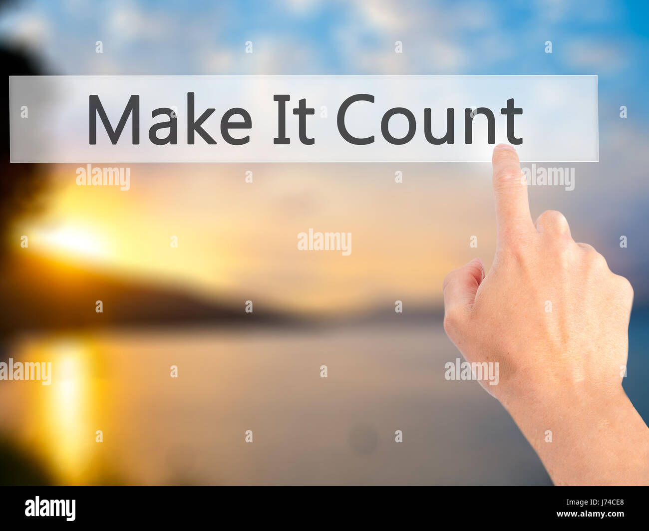 Make It Count - Hand pressing a button on blurred background concept ...