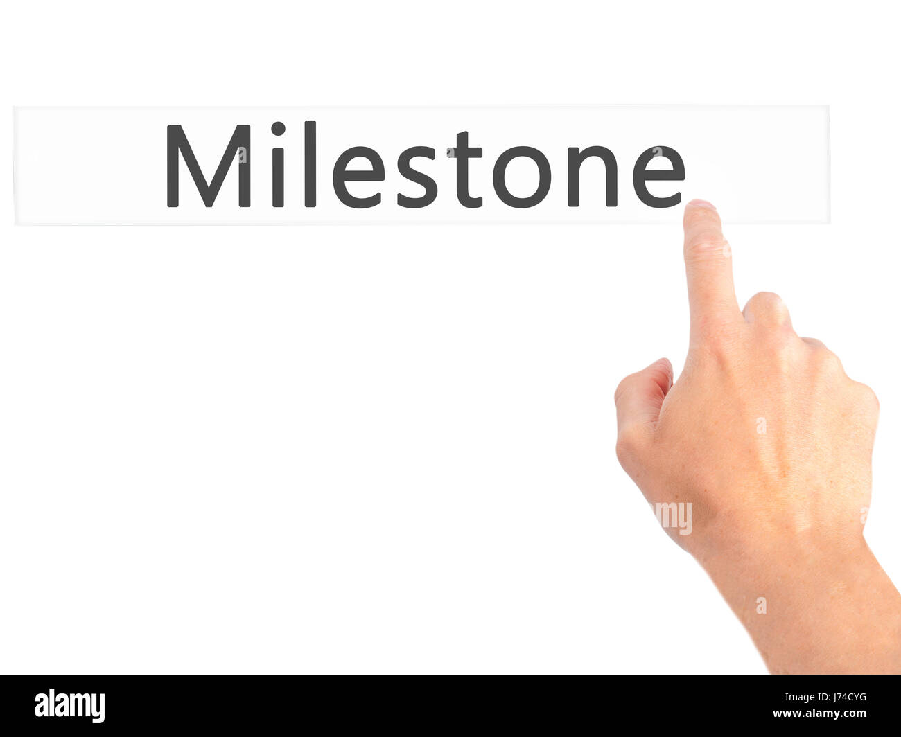 Milestone - Hand pressing a button on blurred background concept ...